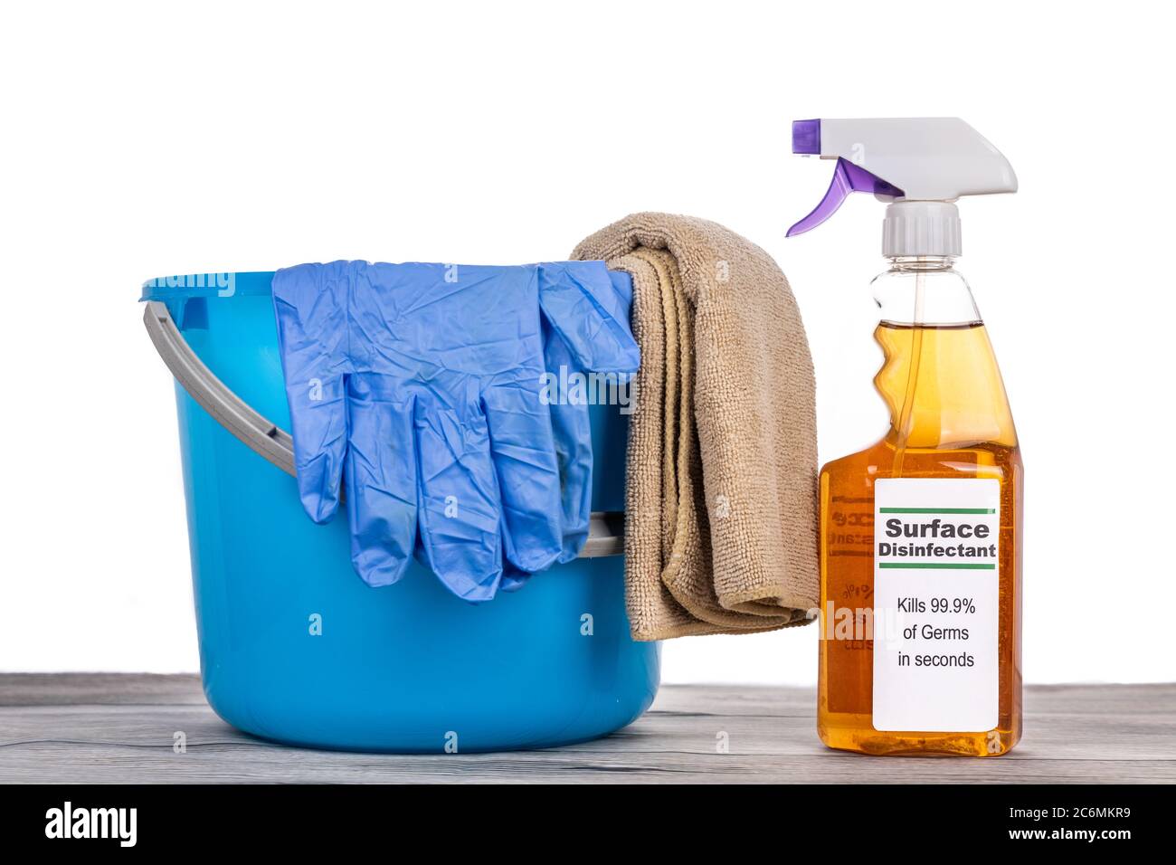 Surface disinfectant spray with pail, gloves and cloth. Complete ...