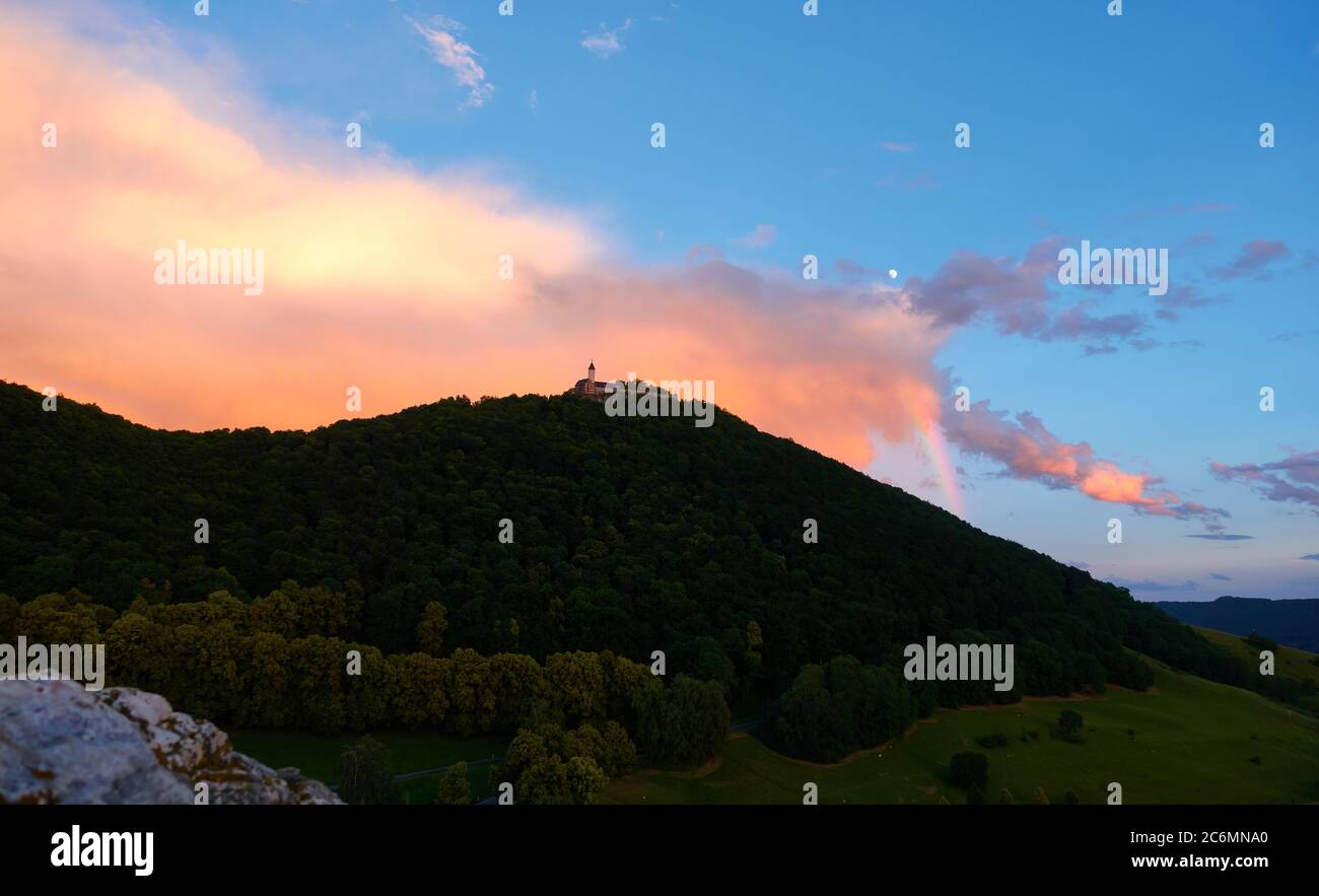 Burck Teck near Kirchheim on a green hill with trees, blue sky with ...