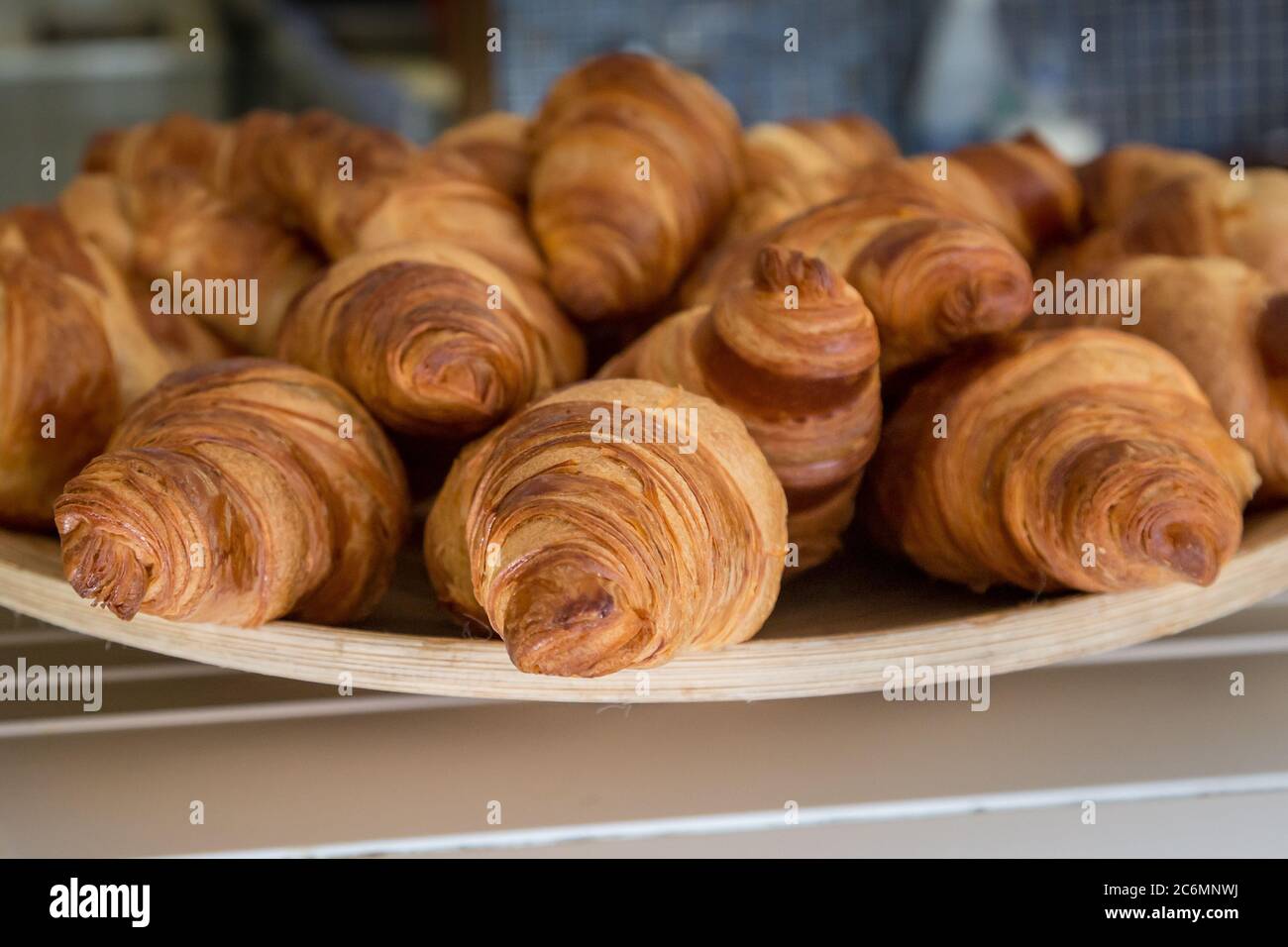 A display of croissants for sale in a coffee shop window Stock Photo ...
