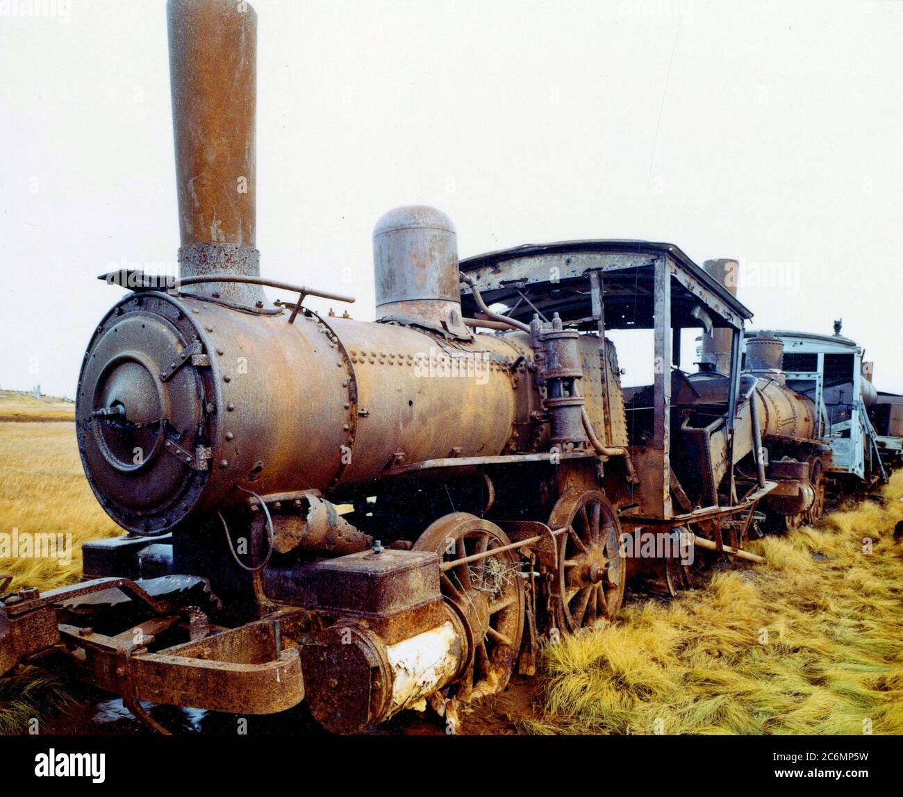 September 1972 - Old abandoned railroad engine near abandoned village ...