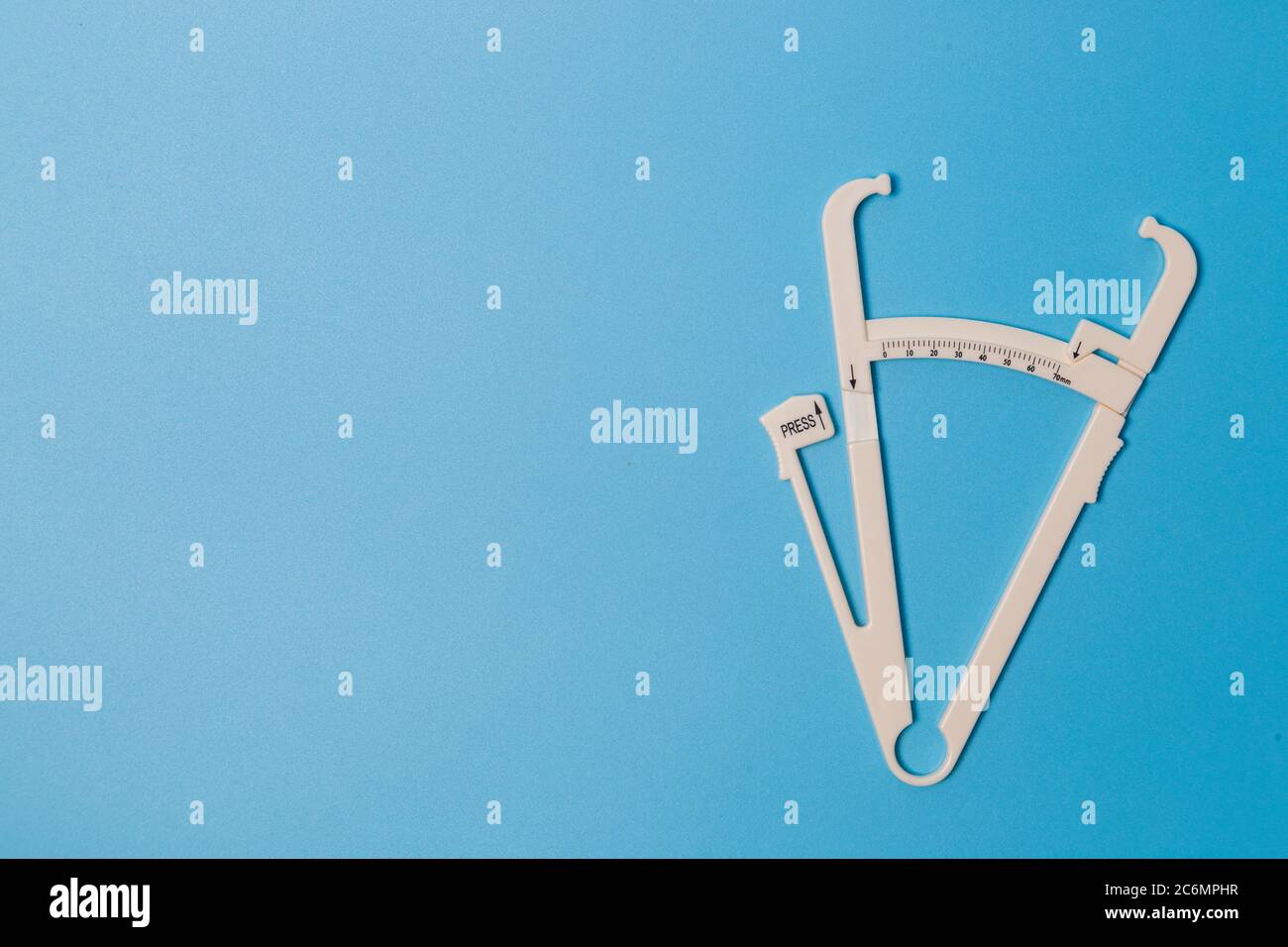 Close up of a tame measurement and body fat caliper Stock Photo - Alamy