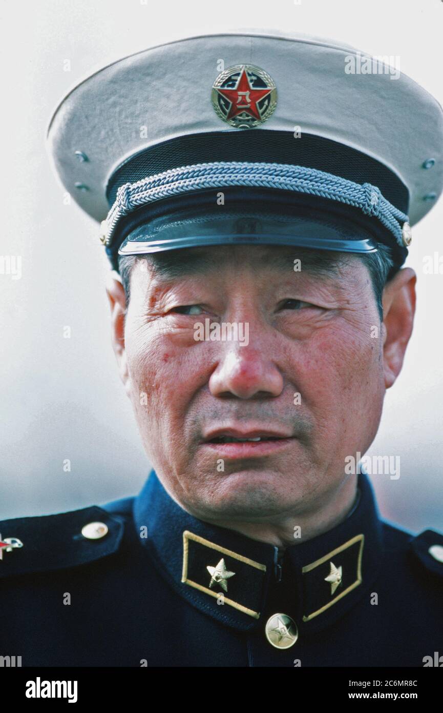 Admiral (ADM) Xinchun Ma, commander of China's North Sea Fleet, watches ...