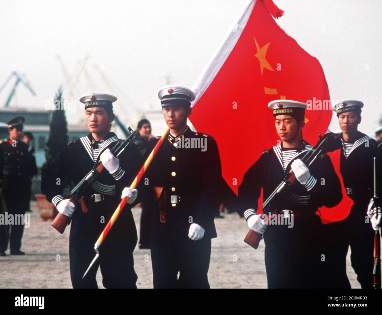 Members of a Chinese color guard armed with Type 56 assault rifles ...