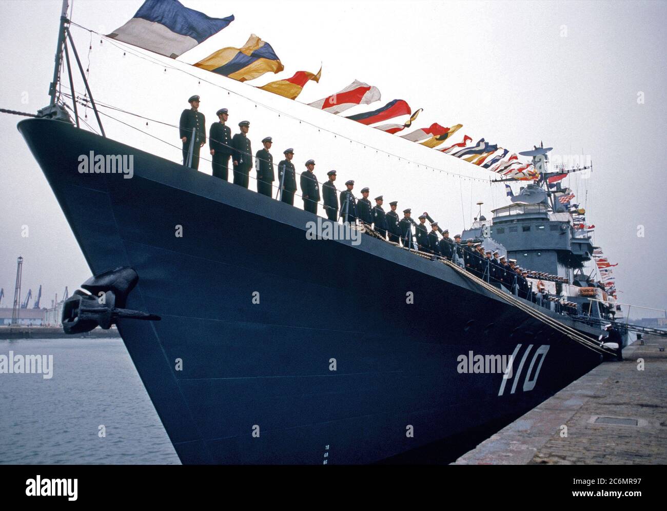 Chinese sailors man the rail of a Chinese destroyer during an ...