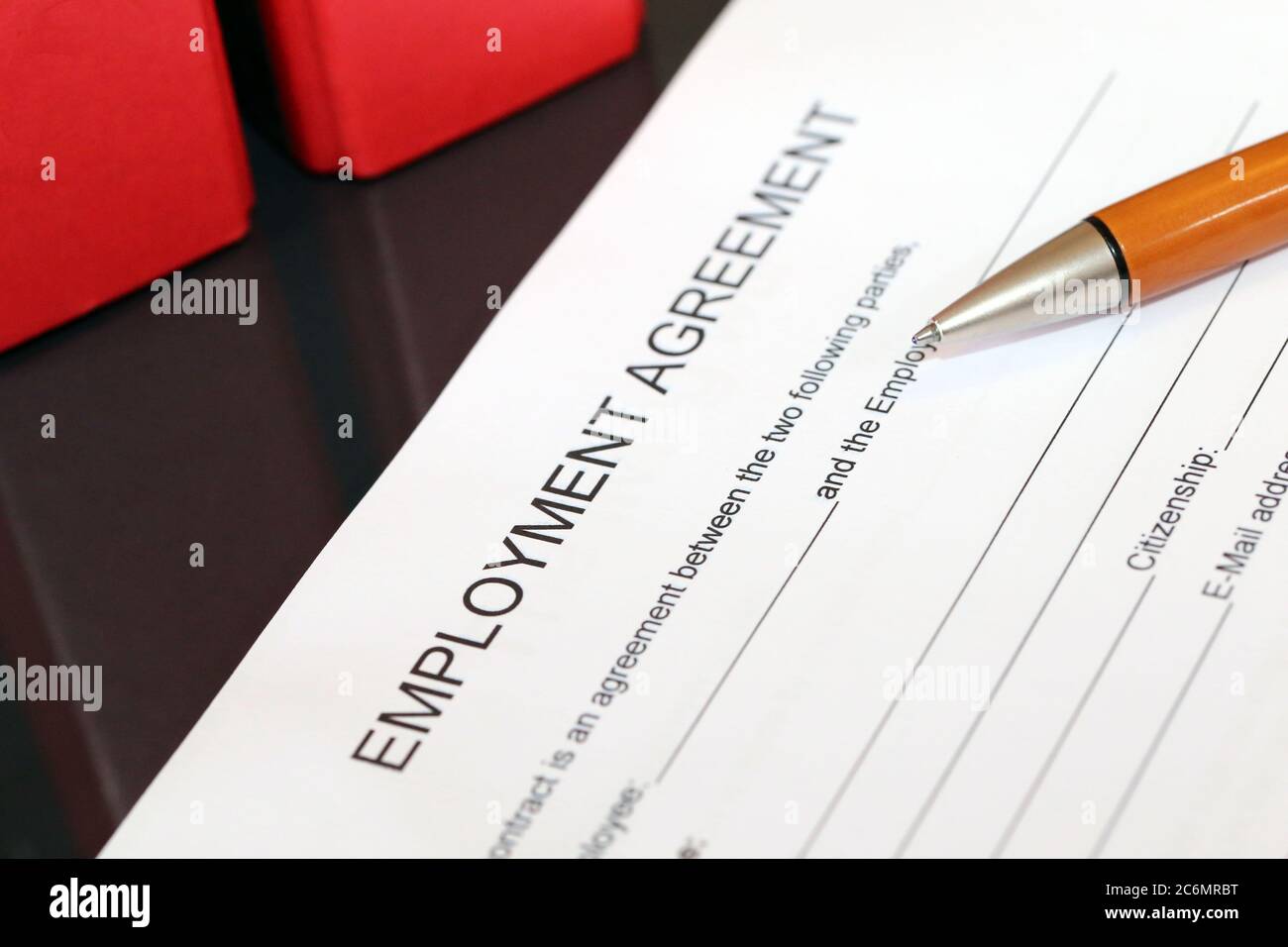 Symbol image: Blank form of an employment agreement on a desk Stock ...