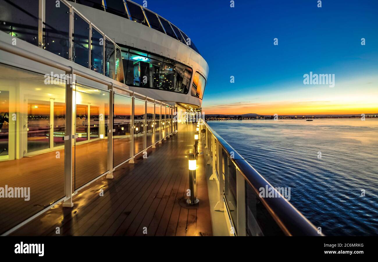 Promenade bridge, cruise ship with sunset. sea view from the deck of a ...
