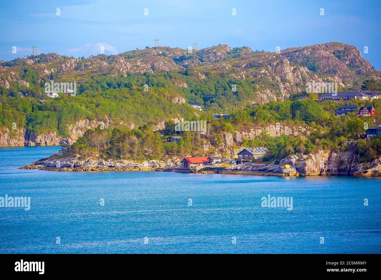 Norwegian scandinavian village landscape with fjord water, mountains ...