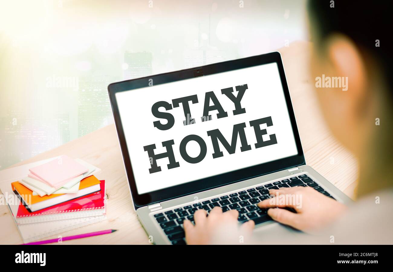 Writing note showing Stay Home Save Lives. Business concept for lessen ...
