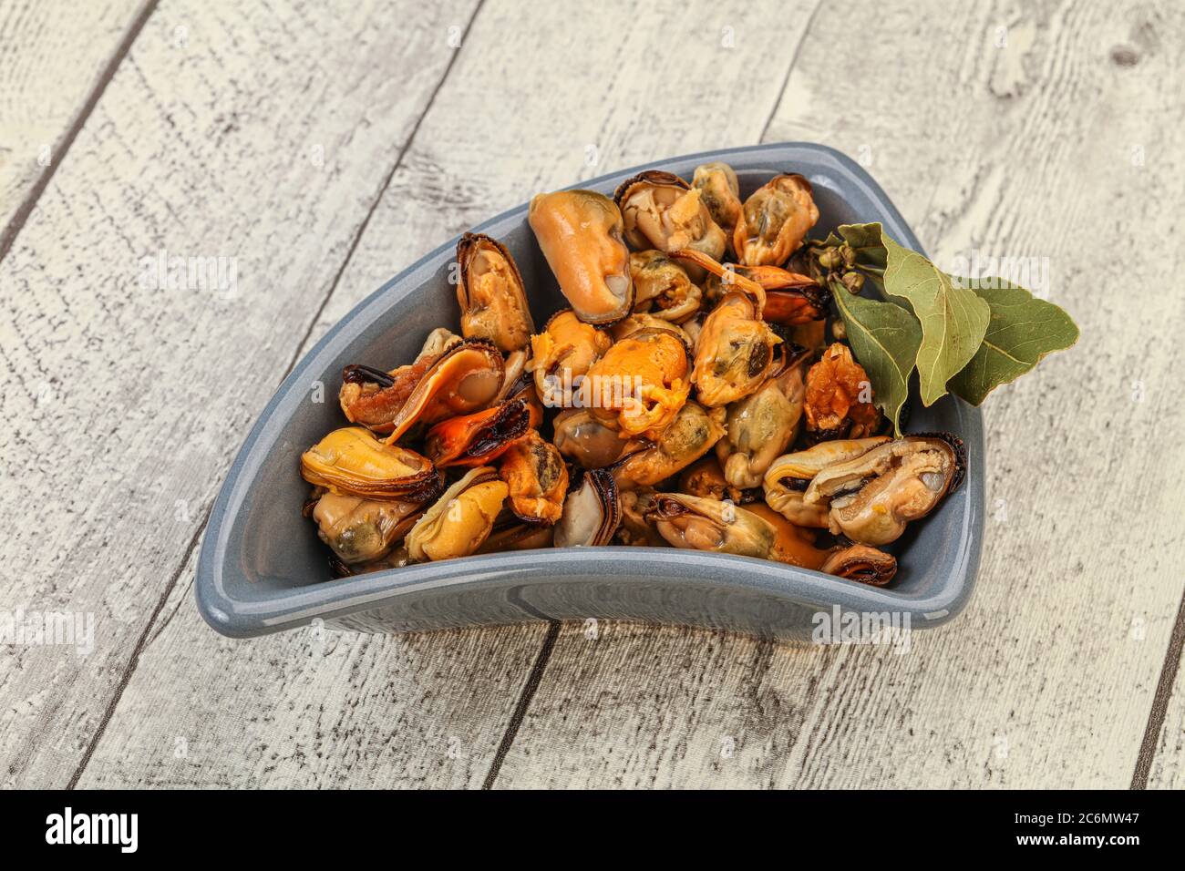 Pickled mussels with spices in the bowl Stock Photo - Alamy