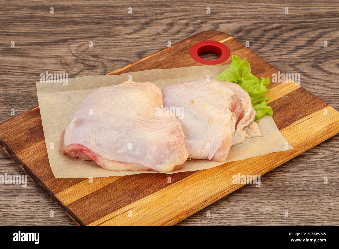 Raw chicken hip ready for cooking Stock Photo - Alamy