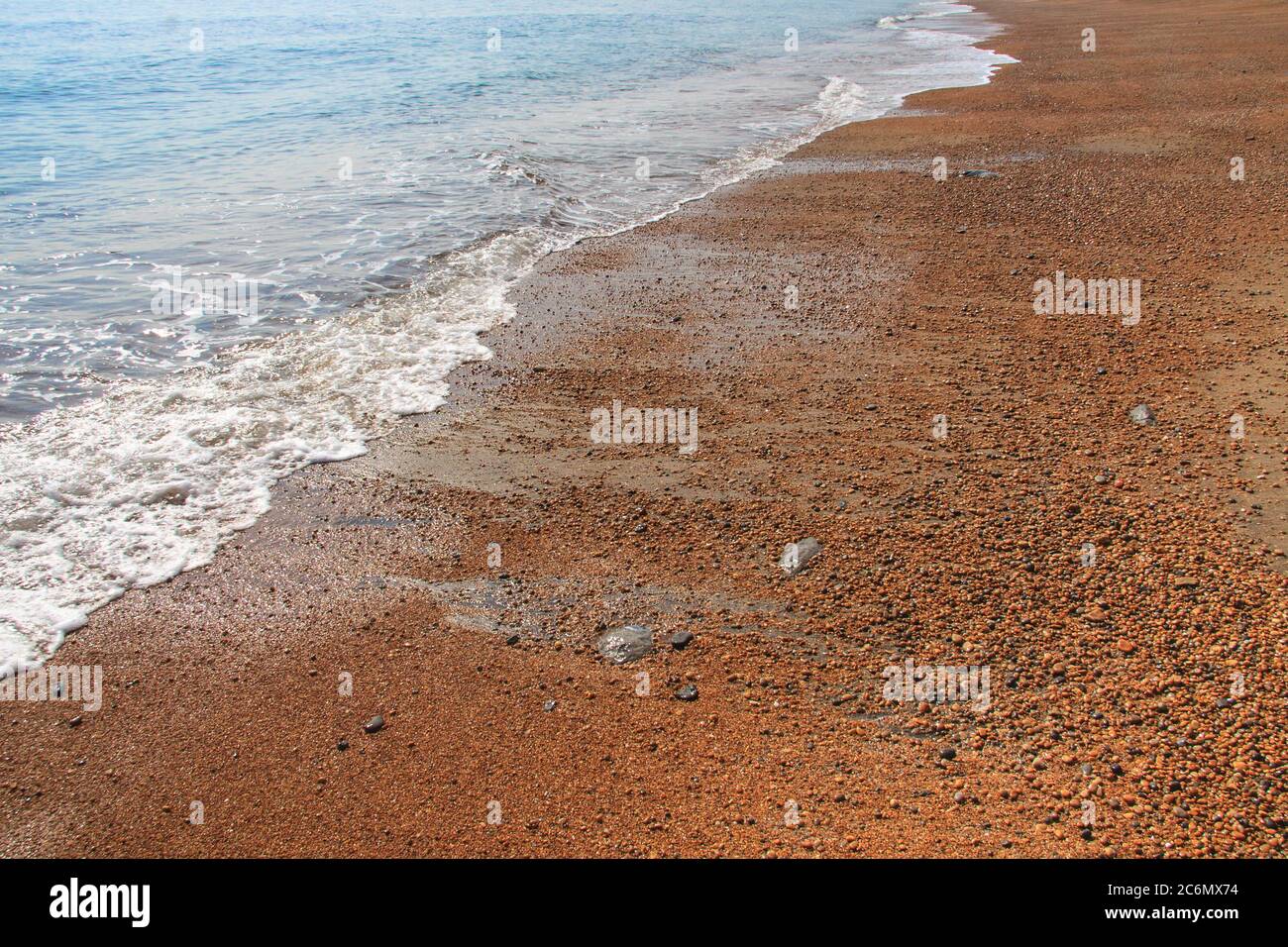 A photograph of the sea and shingle on Whale Chine Beach on the Isle of ...