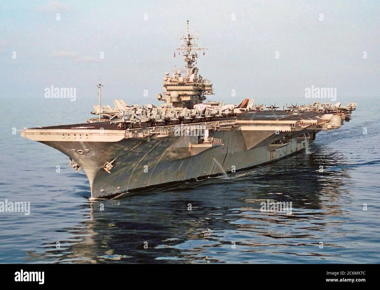 The USS KITTY HAWK (CV 63) operating in the calm South China Seas Stock ...