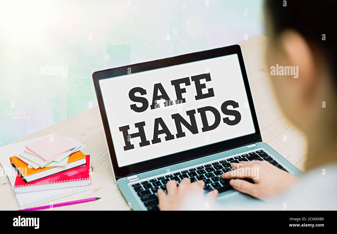Writing note showing Safe Hands. Business concept for Ensuring the ...