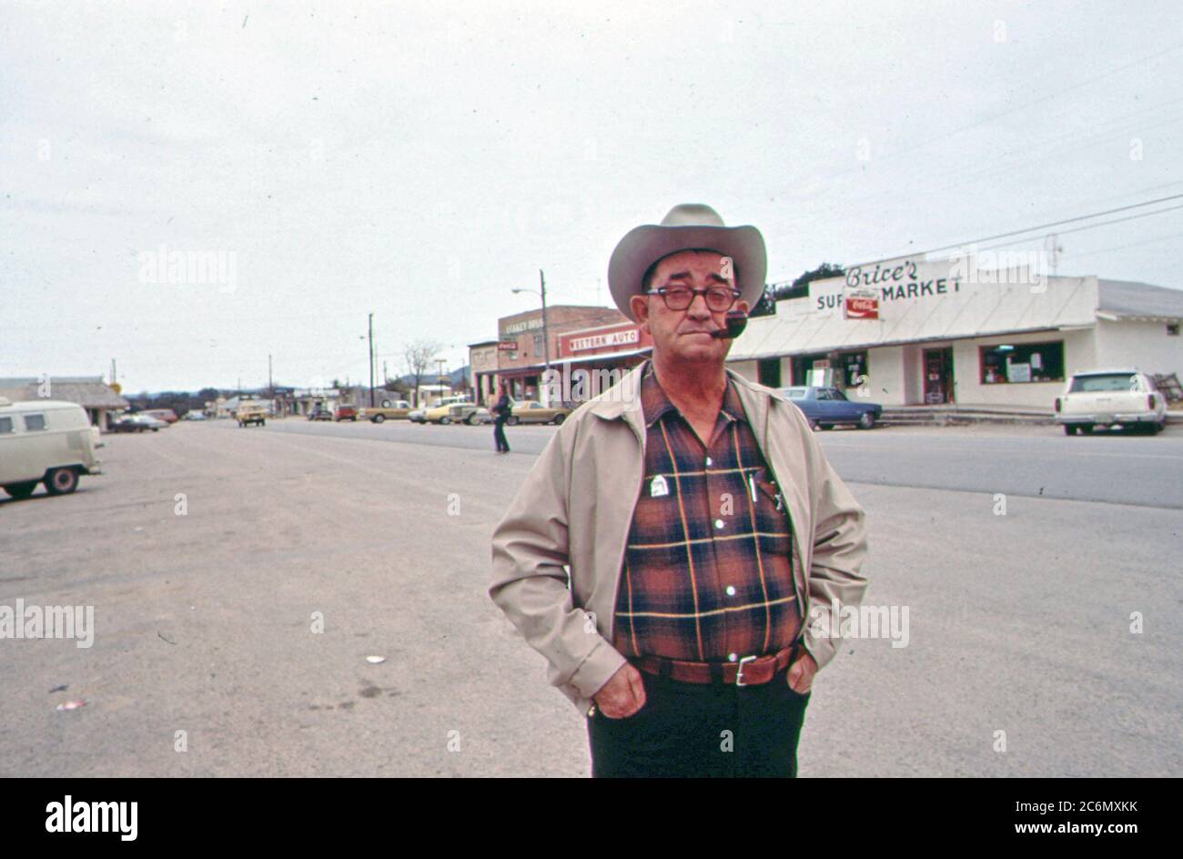 Man standing on Main Street in Leakey Texas in November 1972 Stock ...