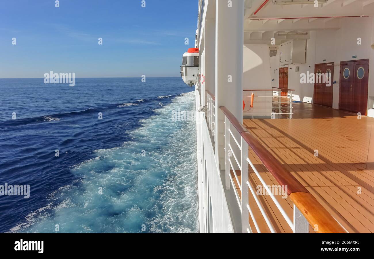 Promenade bridge, cruise ship with sunset. sea view from the deck of a ...