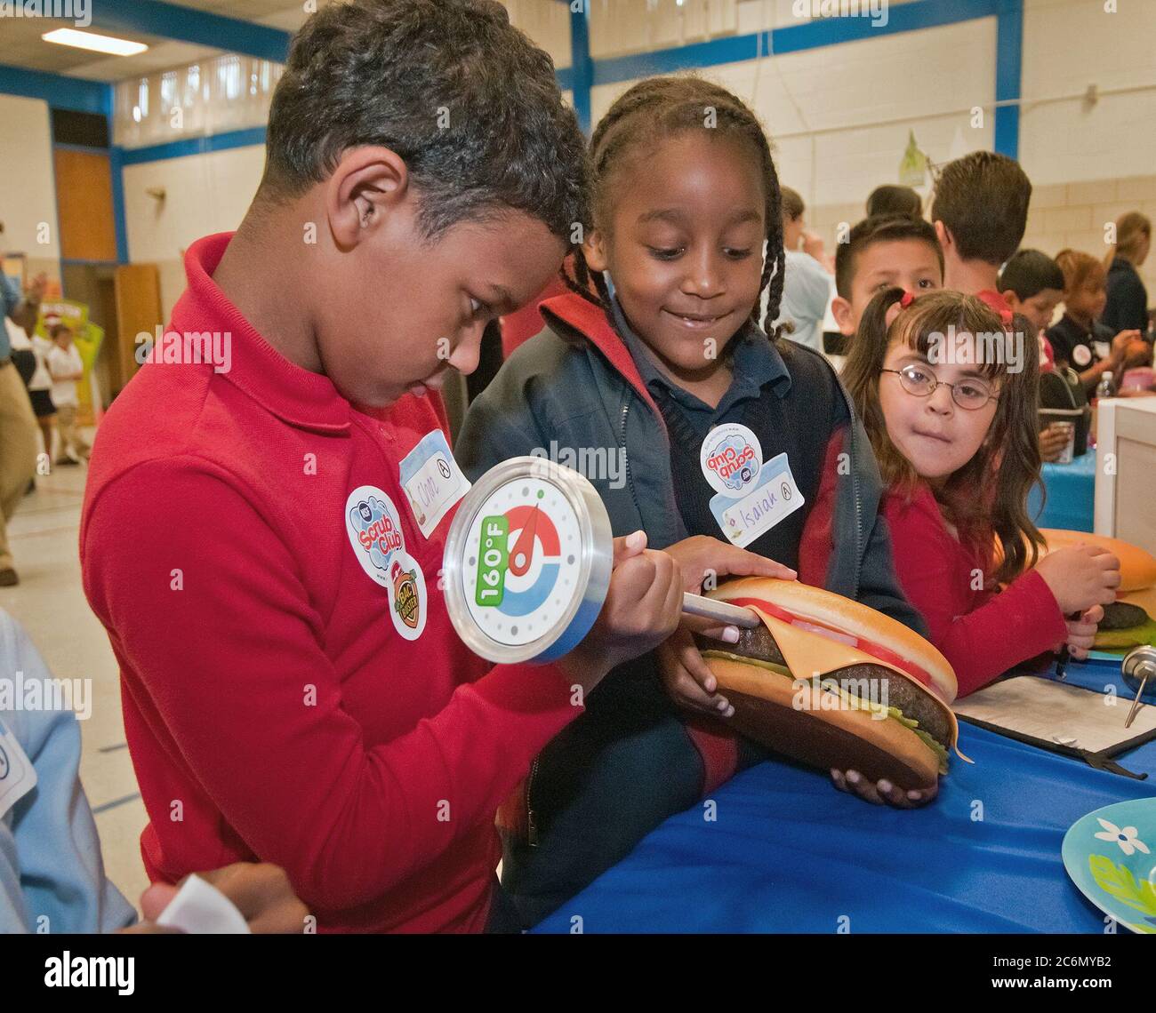 Chaz Clark (left), Isiah Barr (center) and Nancy Teo Quintana students ...