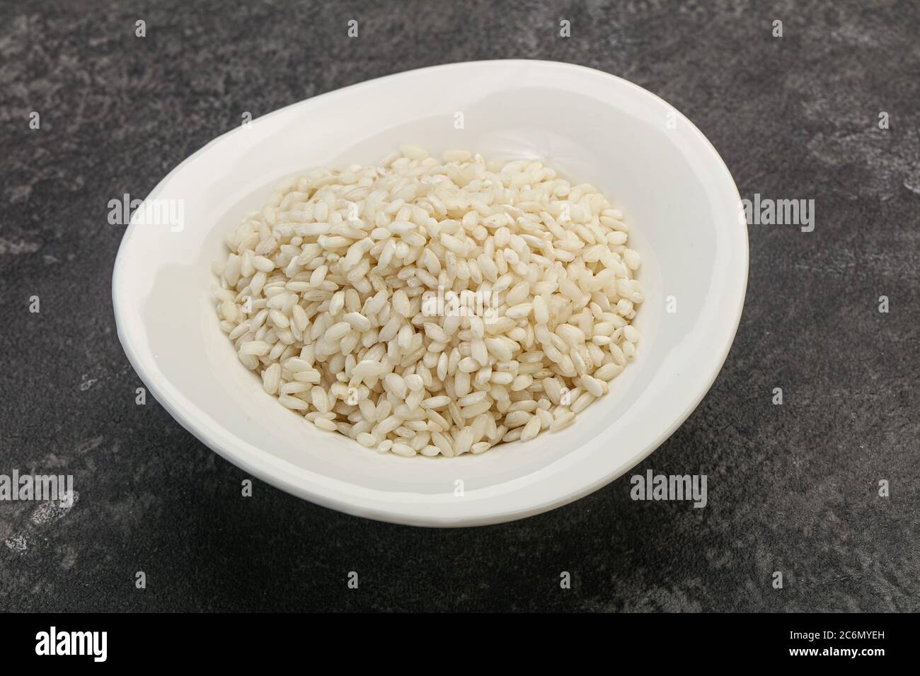Raw Italian arborio rice for Risotto Stock Photo - Alamy