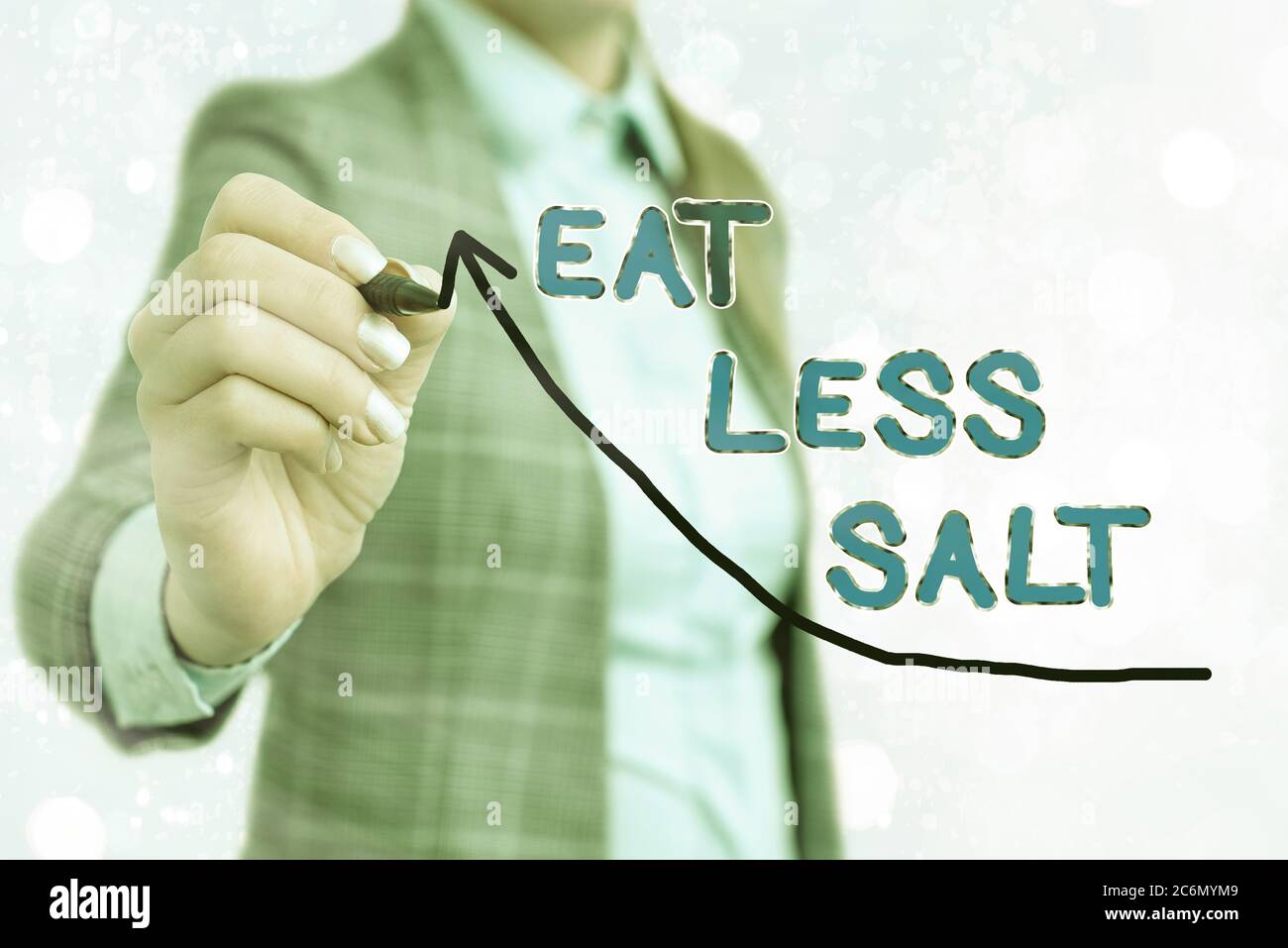 Writing note showing Eat Less Salt. Business concept for reducing the ...