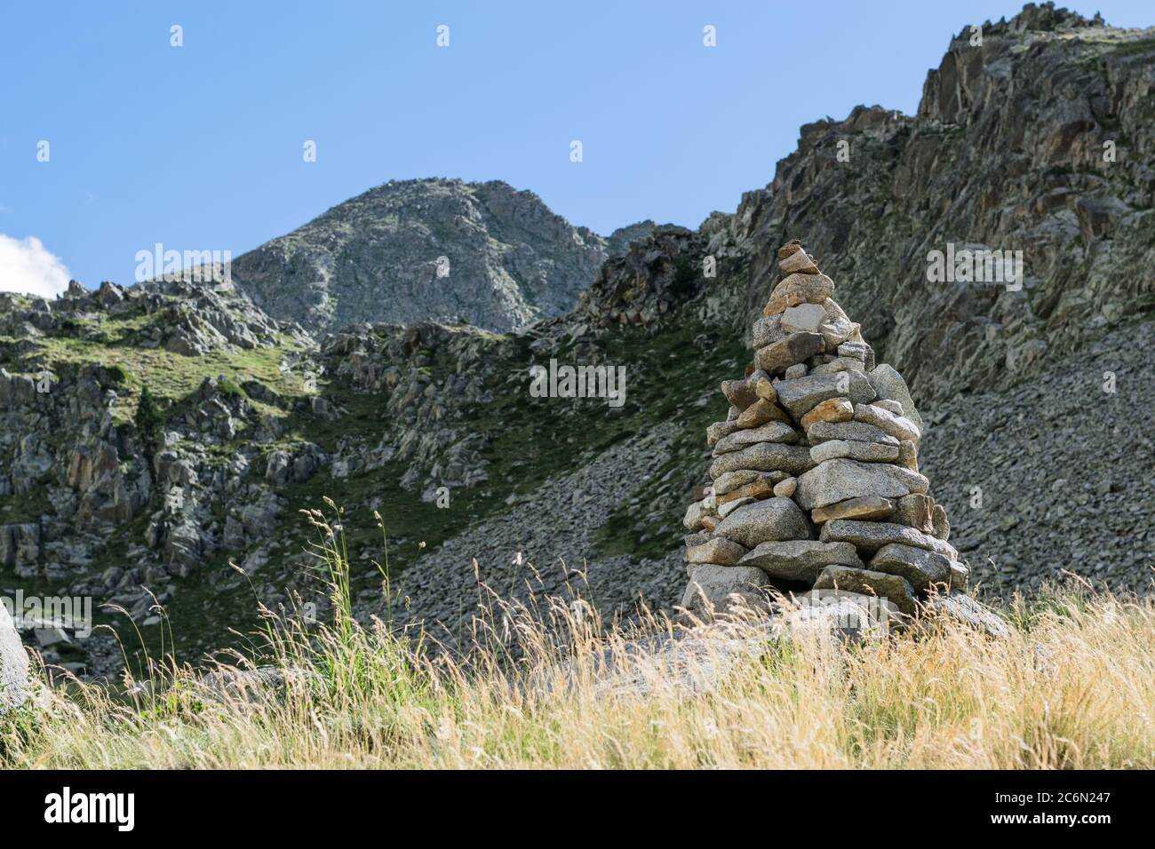Big milestone on the mountain Stock Photo - Alamy
