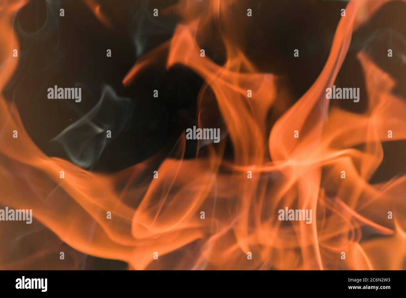 fire fame on black background Stock Photo - Alamy