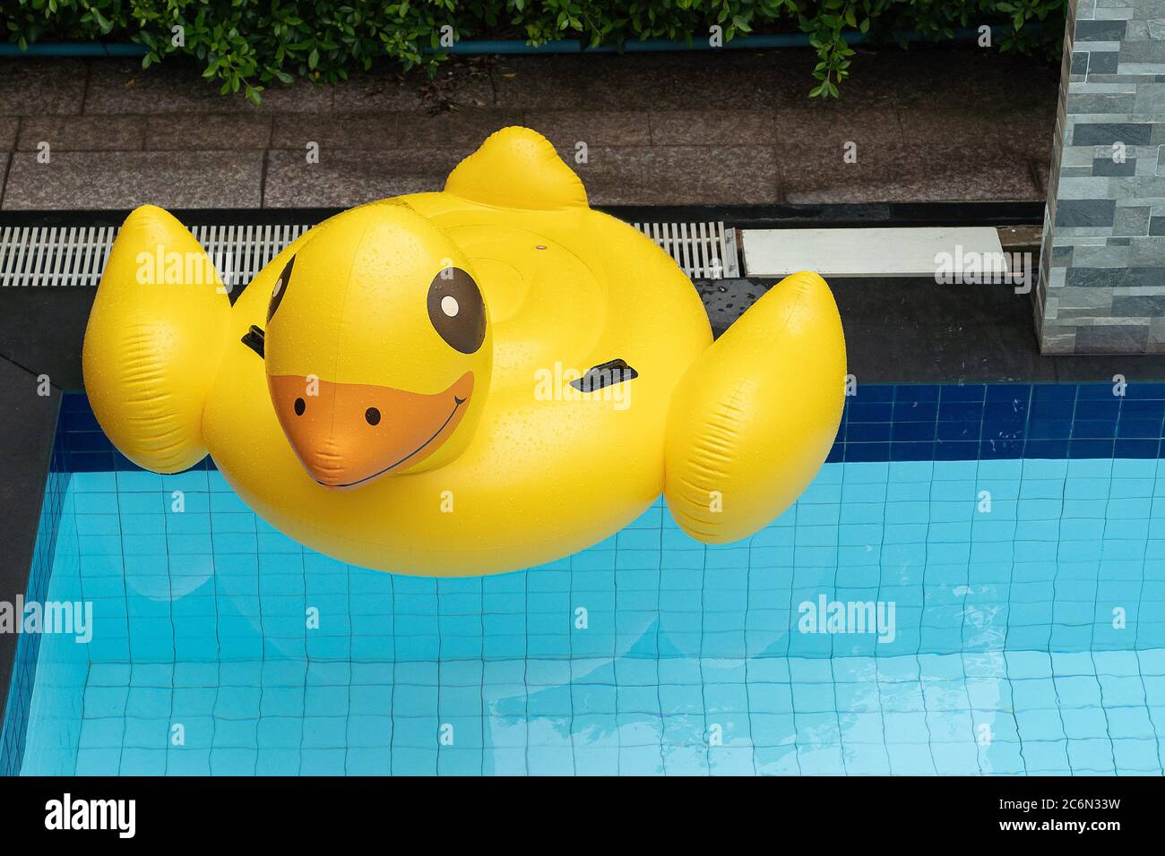 Cartoon yellow duck pool float hi-res stock photography and images - Alamy