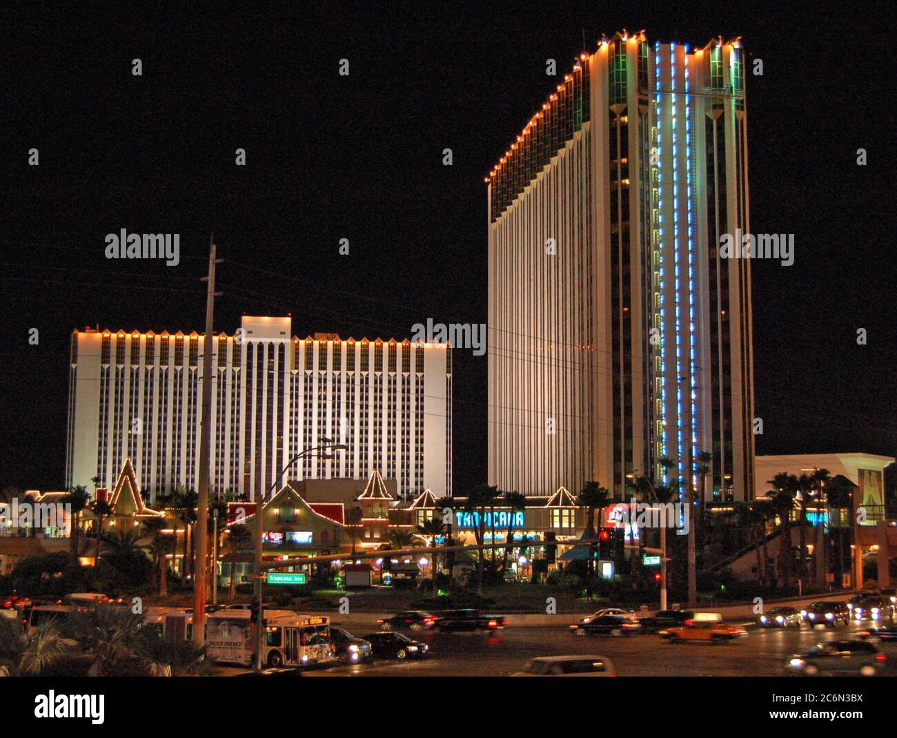 At night, the illuminated towers of the Tropicana Resort & Casino rise ...