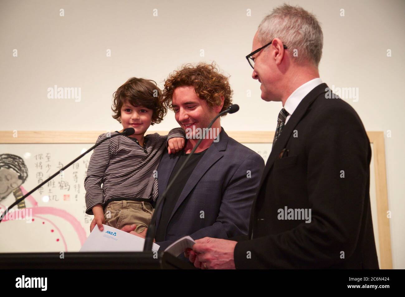AGNSW Director Dr Michael Brand presents artist Vincent Fantauzzo with ...