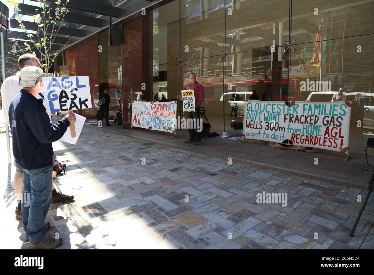 Protesters with signs against Coal Seam Gas and fracking in Gloucester ...