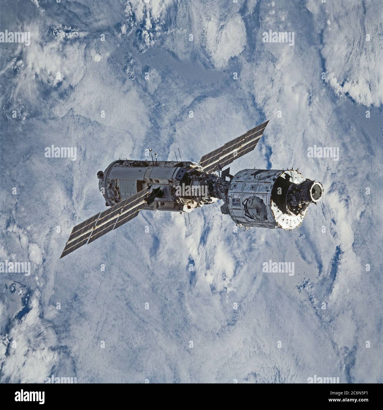 (4-15 Dec. 1998) --- Blanketing clouds form the backdrop for this 70mm ...