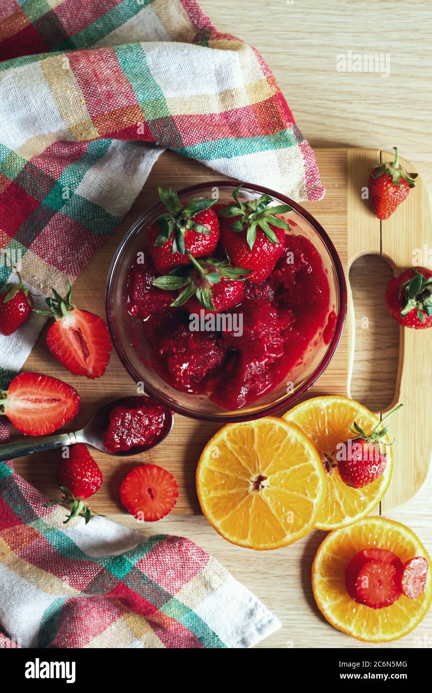 Food art. Tasty composition with strawberry and jam. Sweet summer taste ...