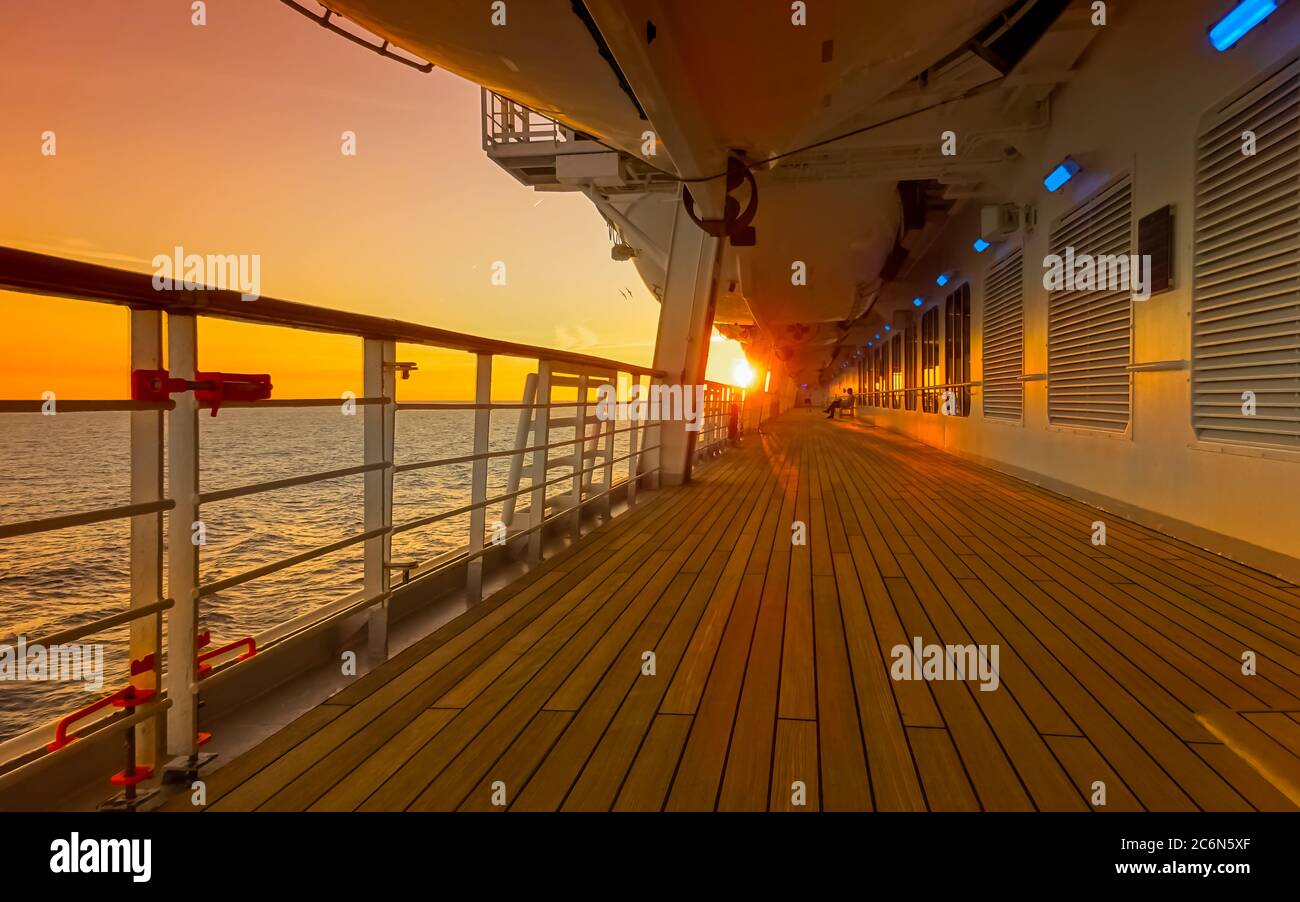 .Promenade bridge, cruise ship with sunset. sea view from the deck of a ...