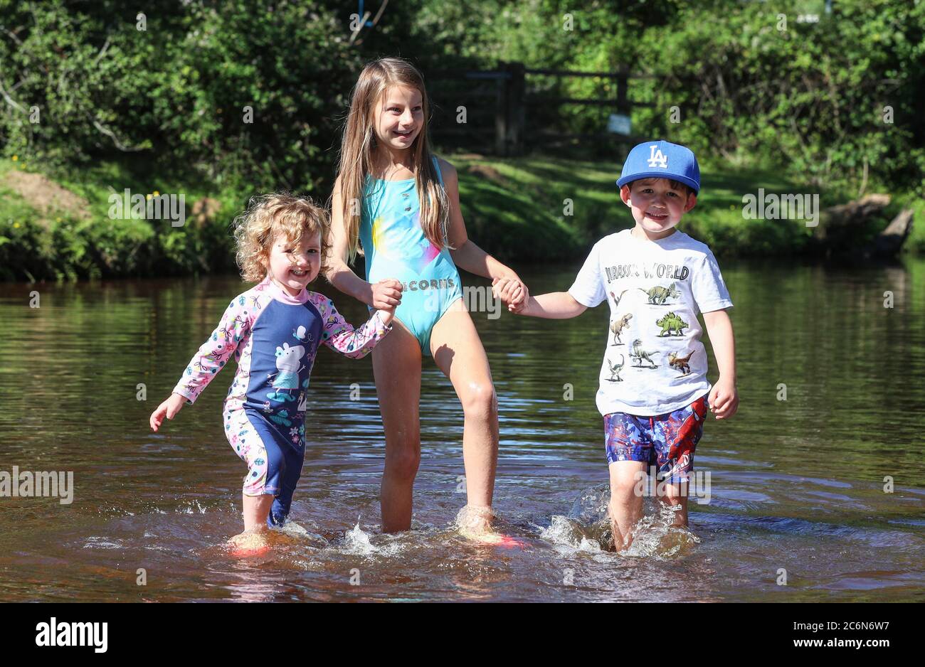 Brockenhurst, New Forest. 11th July 2020. UK Weather. Siblings Nieve ...