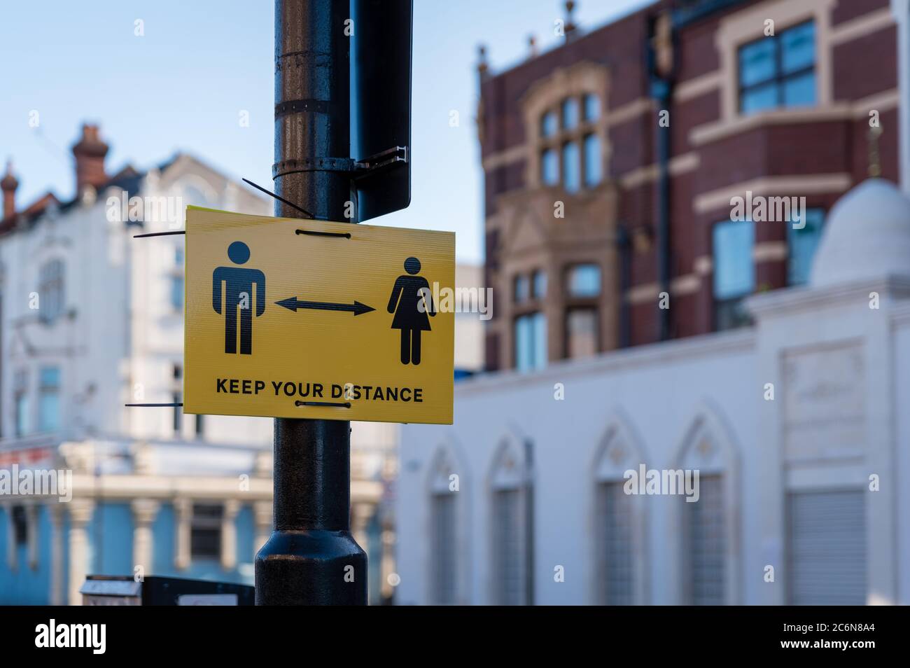Keep your distance signs in East Ham, London Stock Photo - Alamy