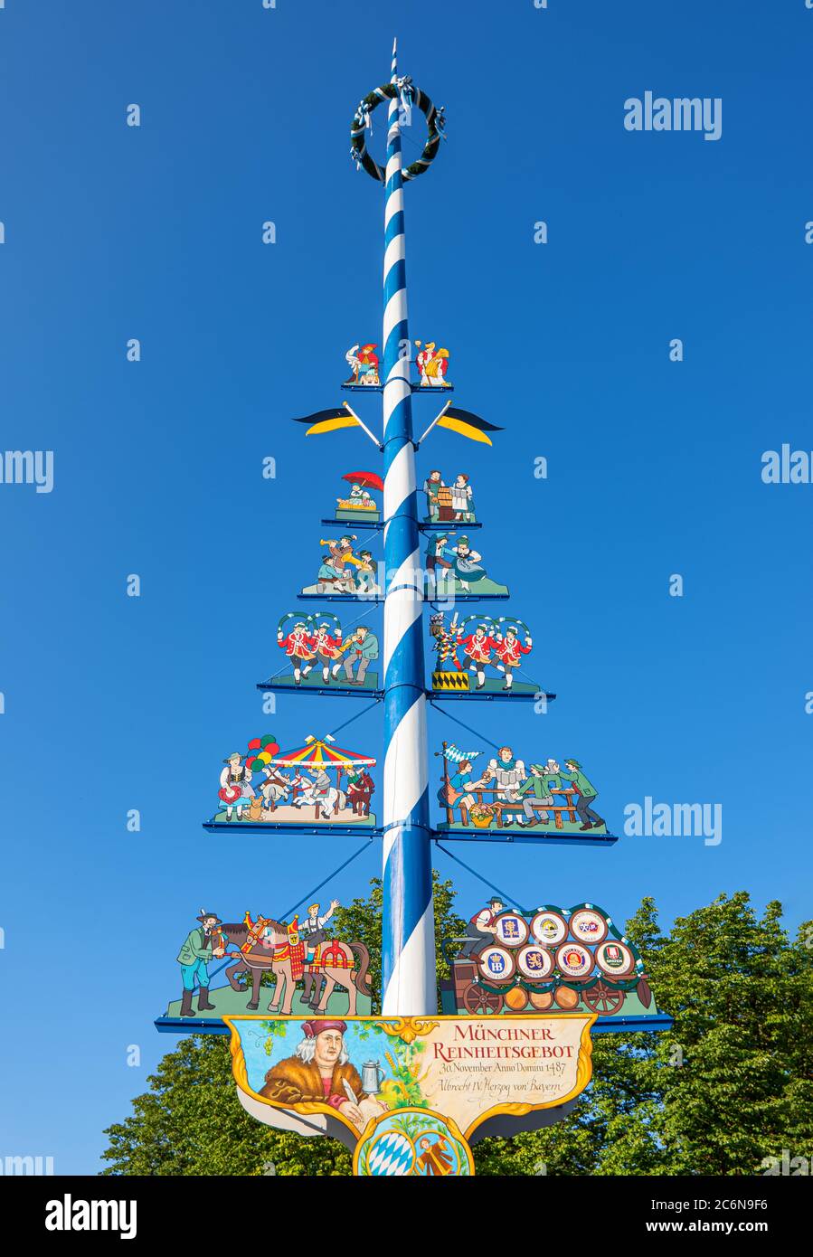 Munich. Germany - July 27, 2018: The Maypole,medieval-style advertising ...