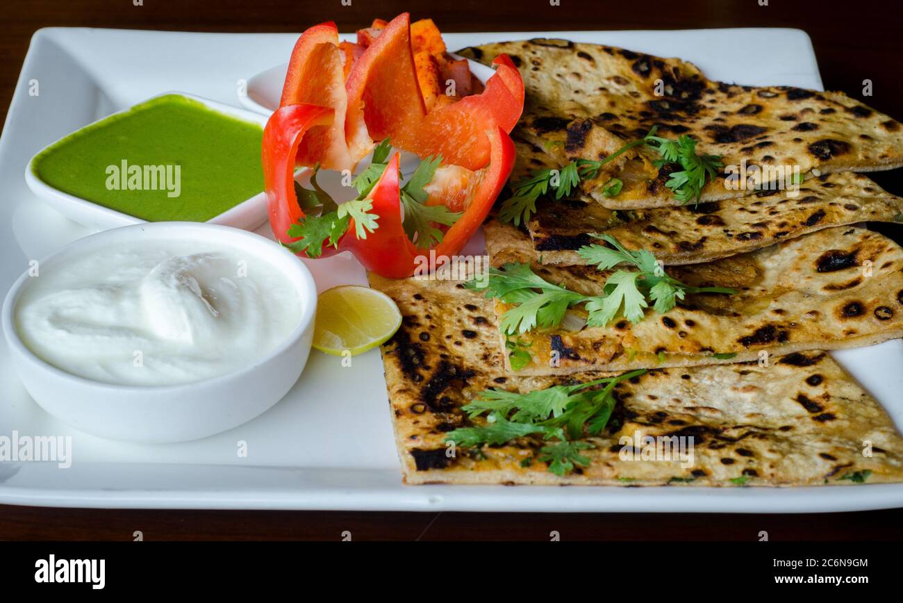 Tasty Stuffed Indian Bread with great presentation Stock Photo - Alamy