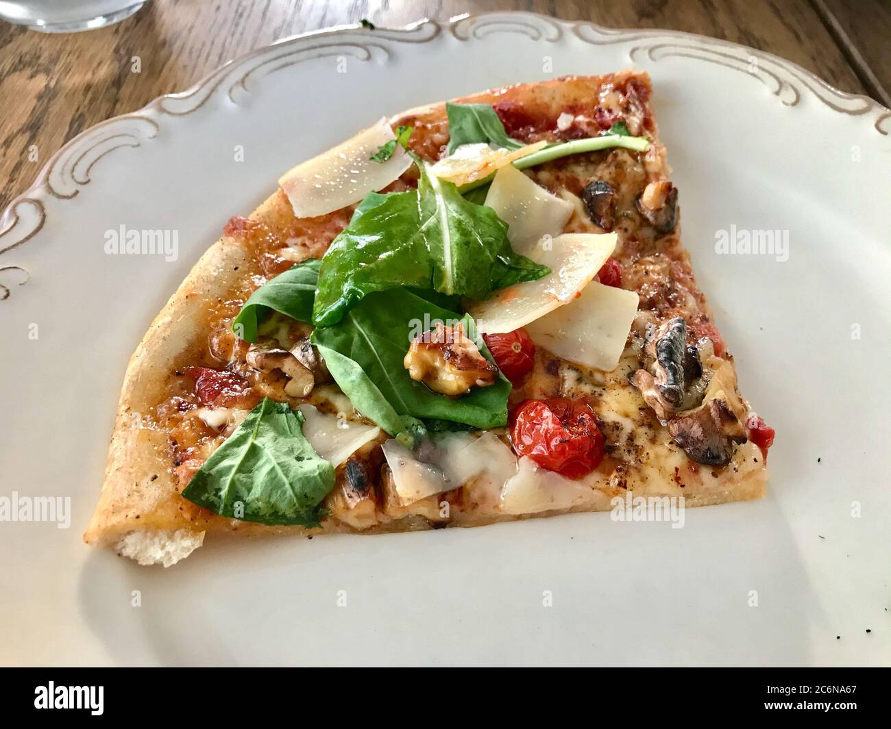 Homemade Pizza Slice with Parmesen Cheese Slice, Arugula, Rucola or ...