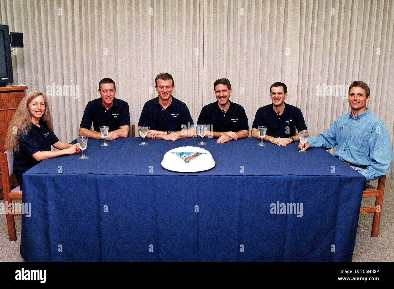 The STS-81 flight crew enjoys the traditional preliftoff breakfast in ...