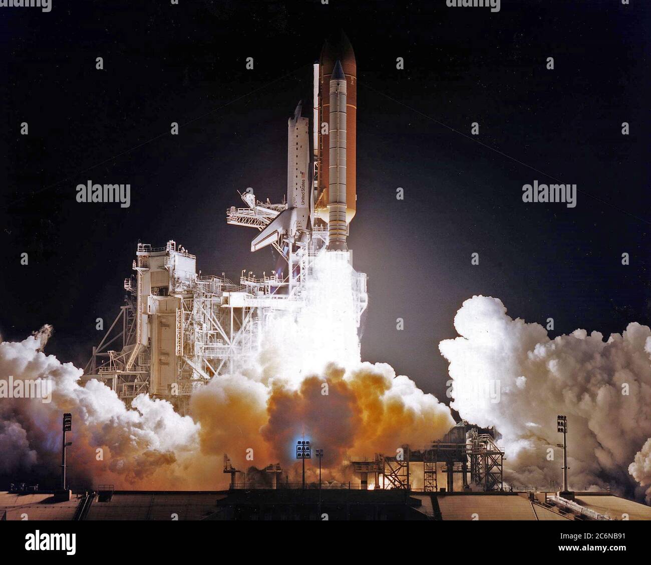 The Space Shuttle Atlantis transforms the early morning at KSC into ...