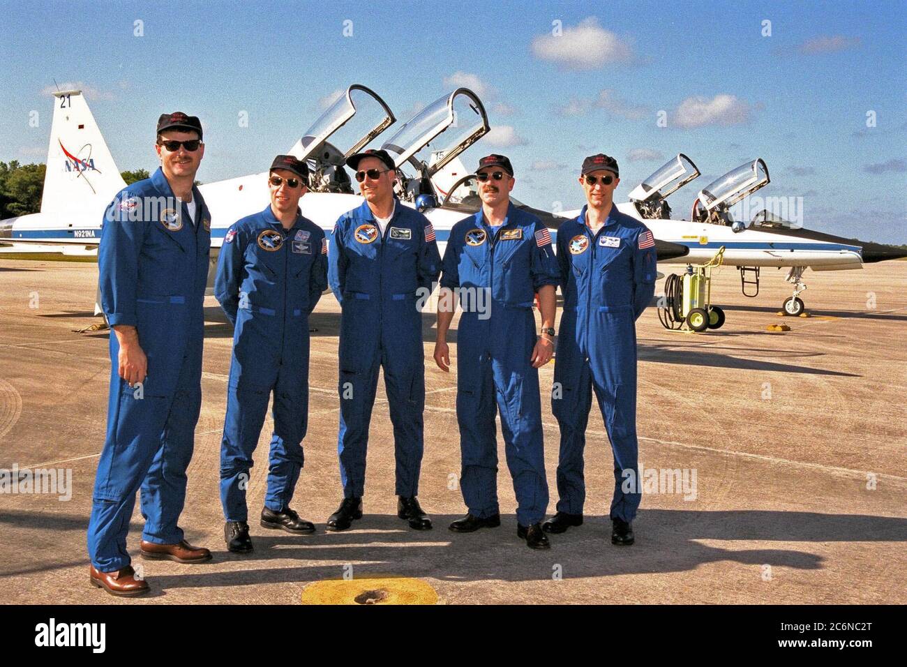 Members of the STS-90 crew pose together shortly after arriving at the ...
