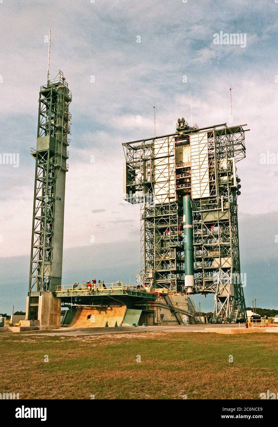 The first stage of a Boeing Delta II rocket is in position on the ...