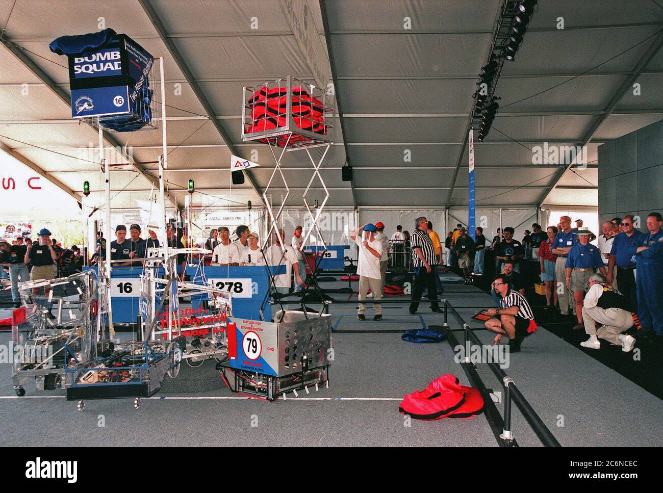 Four robots vie for position on the playing field during the 1999 FIRST ...