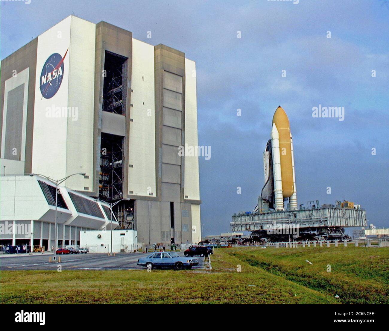Towering atop the mobile launcher platform and crawler transporter ...