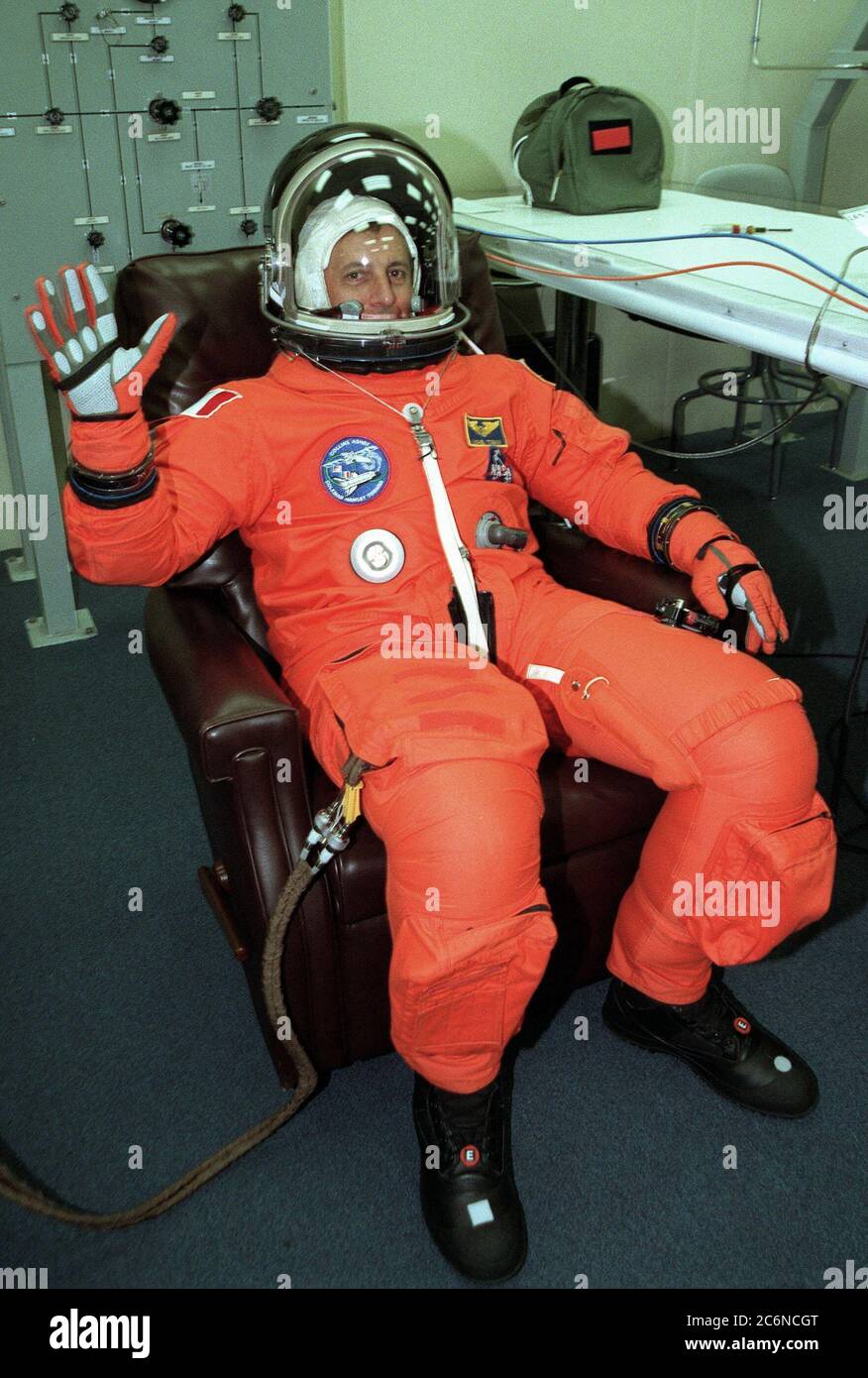 In the Operations and Checkout Building, STS-93 Mission Specialist ...