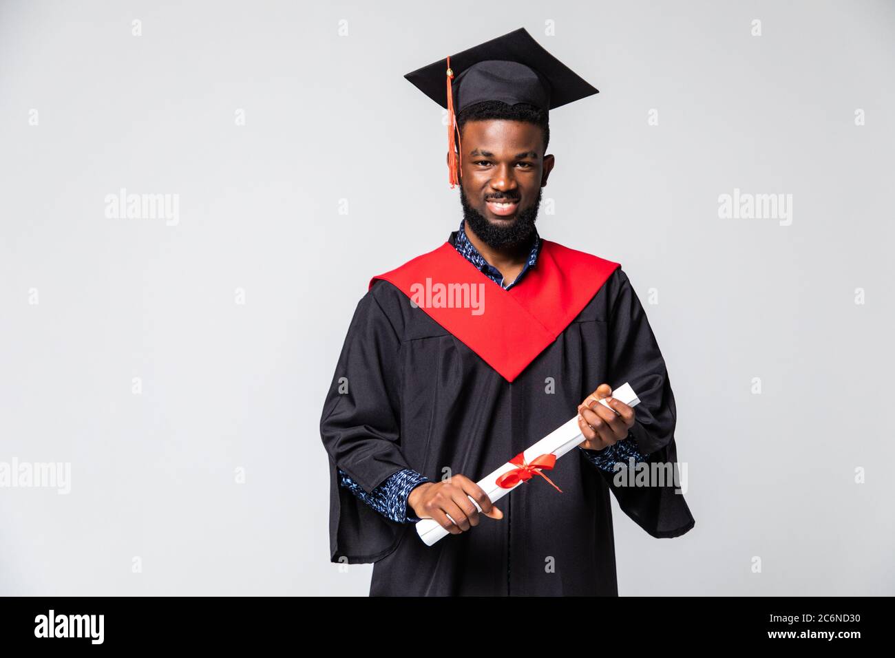 Young Happy African American Male Student Holding Graduation ...