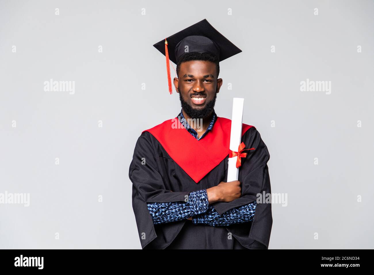 Young Happy African American Male Student Holding Graduation ...