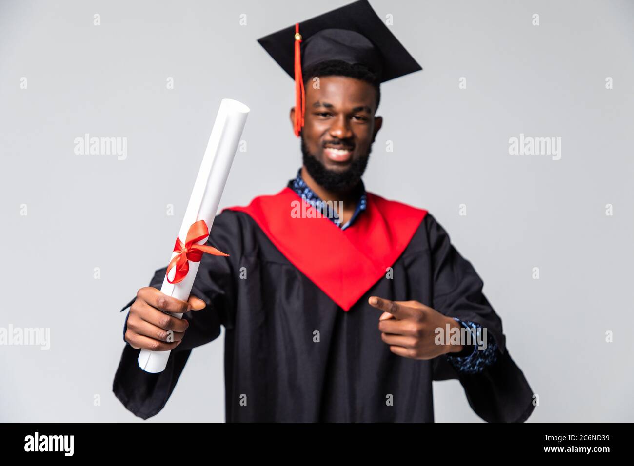 Young Happy African American Male Student Holding Graduation ...