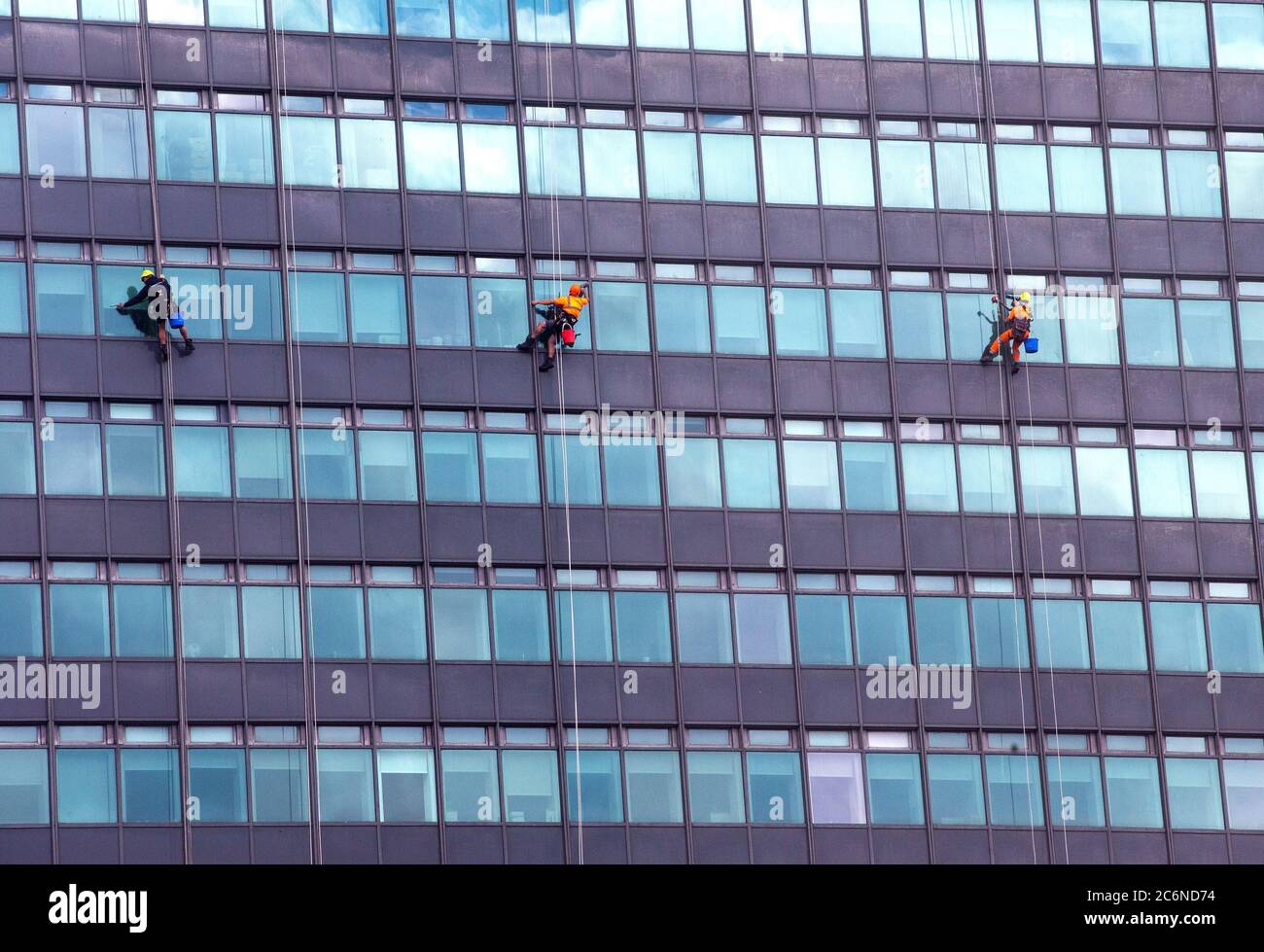 Window cleaners cleaning City Tower, a 30-story building in Piccadilly ...