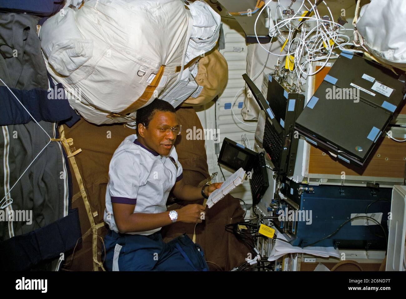 (24 Jan 1998) --- With checklist in hand on the Space Shuttle Endeavour ...