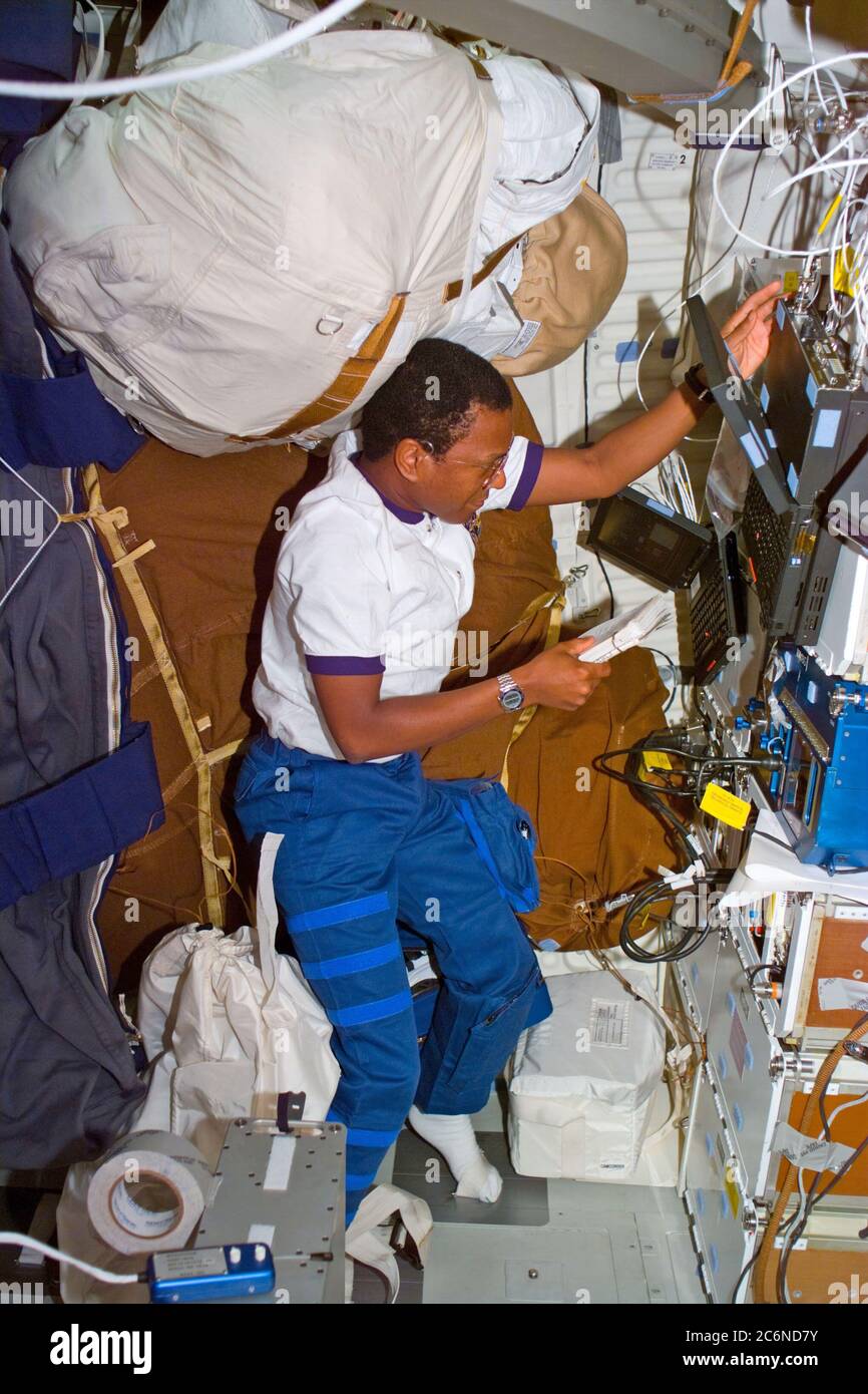 (24 Jan 1998) --- With checklist in hand on the Space Shuttle Endeavour ...