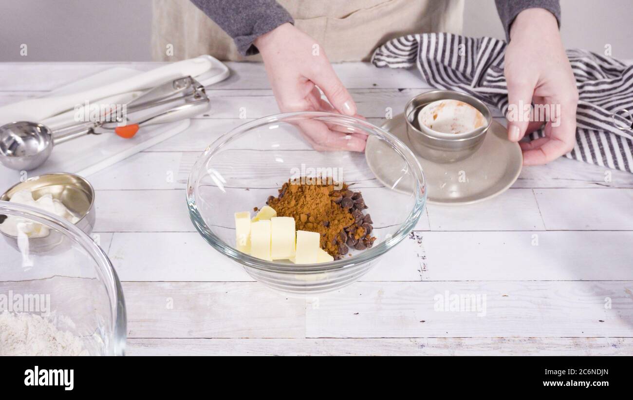 Mixing ingredients to bake chocolate raspberry cupcakes Stock Photo - Alamy